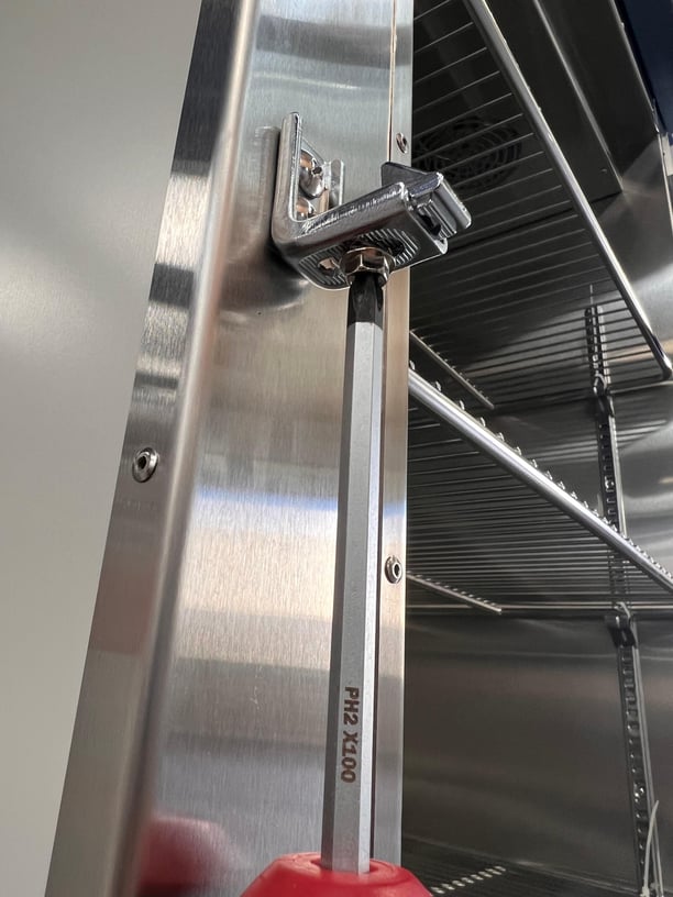 How to adjust a lever latch door